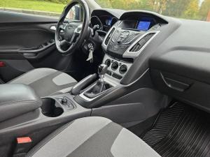 Blue Ford Focus 2012 in Jekabpils, with an engine capacity of 1.60 L and mileage of 276 thousand km for 4590 €, photo 21 on AUTOMOTO.COM.LV