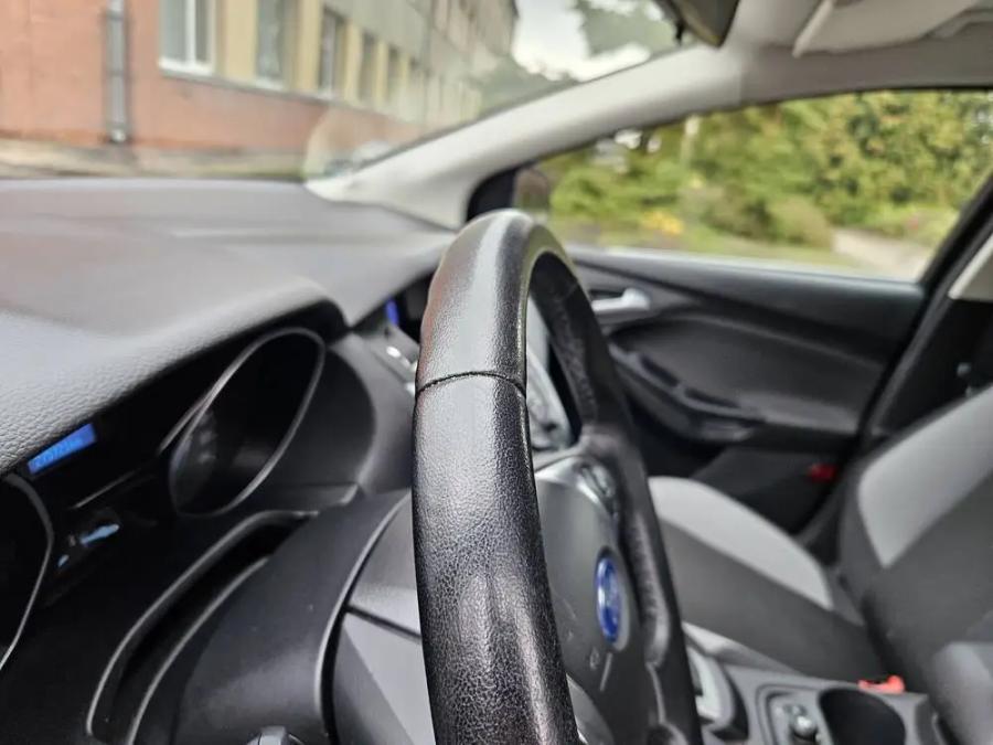 Blue Ford Focus 2012 in Jekabpils, with an engine capacity of 1.60 L and mileage of 276 thousand km for 4590 €, photo 25 on AUTOMOTO.COM.LV