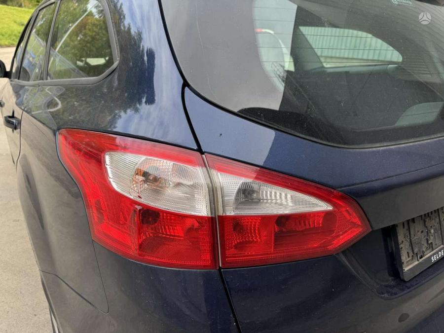 Blue Ford Focus 2013 in Alytus, with an engine capacity of 1.60 L and mileage of 244 thousand km for 2750 €, photo 23 on AUTOMOTO.COM.LV
