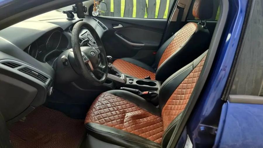 Blue Ford Focus 2014 in Cesis, with an engine capacity of 1.60 L and mileage of 300 thousand km for 4200 €, photo 18 on AUTOMOTO.COM.LV