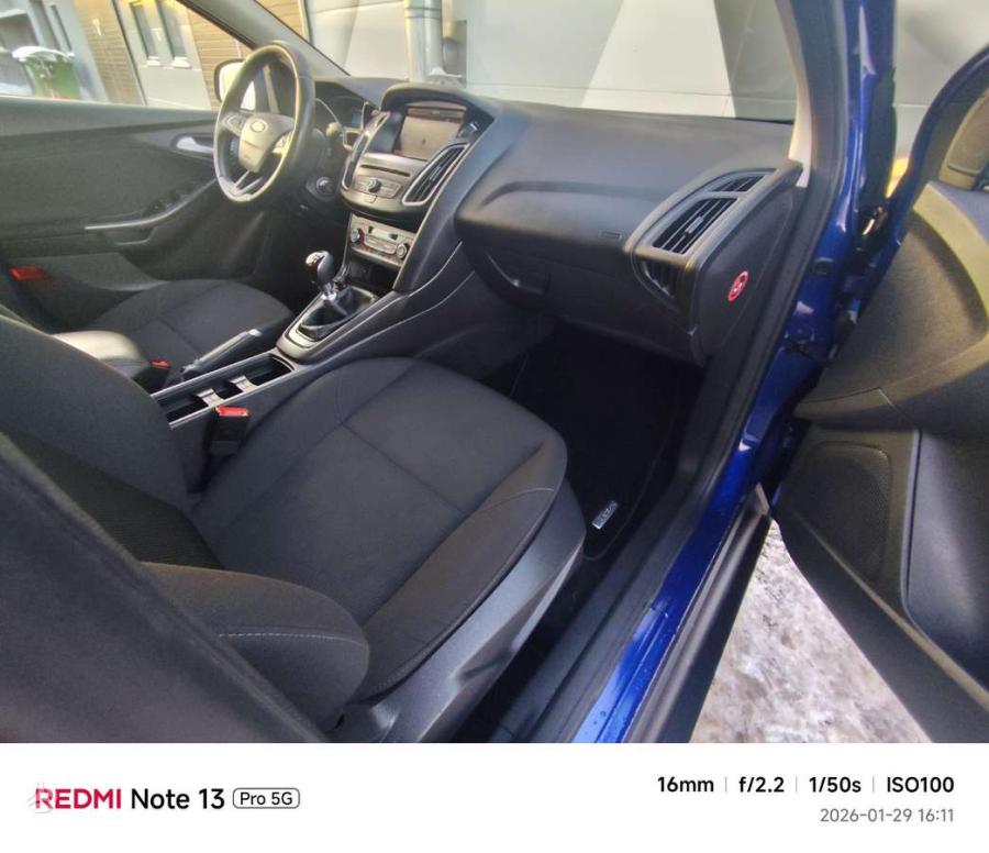 Blue Ford Focus 2016 in Kaunas, with an engine capacity of 1.50 L and mileage of 152 thousand km for 5450 €, photo 18 on AUTOMOTO.COM.LV