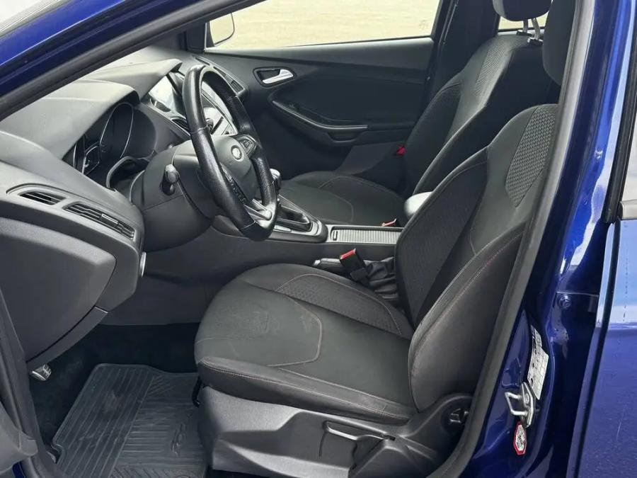 Blue Ford Focus 2017 in Riga, with an engine capacity of 1.00 L and mileage of 156 thousand km for 7900 €, photo 10 on AUTOMOTO.COM.LV