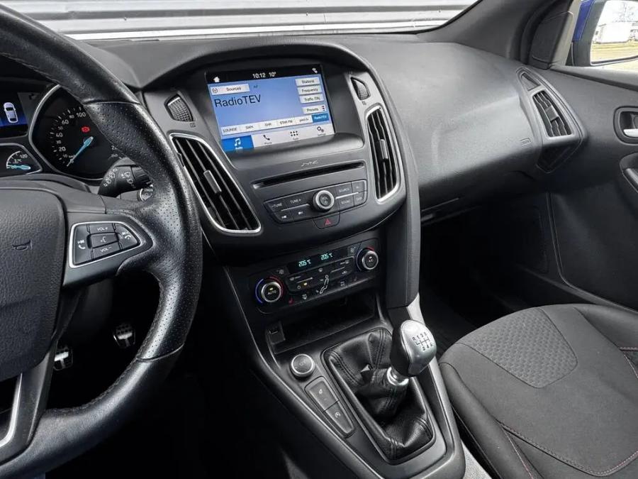 Blue Ford Focus 2017 in Riga, with an engine capacity of 1.00 L and mileage of 156 thousand km for 7900 €, photo 18 on AUTOMOTO.COM.LV