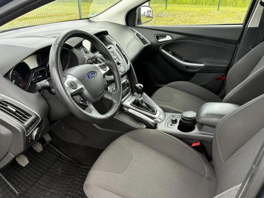 Brown Ford Focus 2011 in Saldus, with an engine capacity of 2.00 L and mileage of 199 thousand km for 5200 €, photo 8 on AUTOMOTO.COM.LV