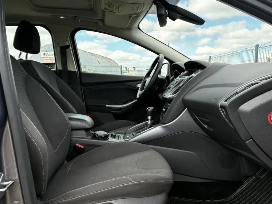 Brown Ford Focus 2011 in Saldus, with an engine capacity of 2.00 L and mileage of 199 thousand km for 5200 €, photo 15 on AUTOMOTO.COM.LV