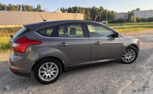 Brown Ford Focus 2011 in Vilnius, with an engine capacity of 1.56 L and mileage of 244 thousand km for 1800 €, photo 7 on AUTOMOTO.COM.LV