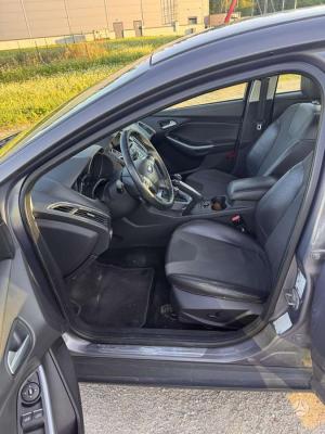 Brown Ford Focus 2011 in Vilnius, with an engine capacity of 1.56 L and mileage of 244 thousand km for 1800 €, photo 14 on AUTOMOTO.COM.LV