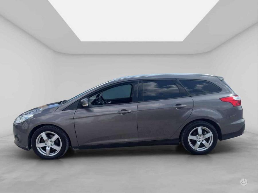 Brown Ford Focus 2011 in Kaunas, with an engine capacity of 1.60 L and mileage of 284 thousand km for 3990 €, photo 4 on AUTOMOTO.COM.LV