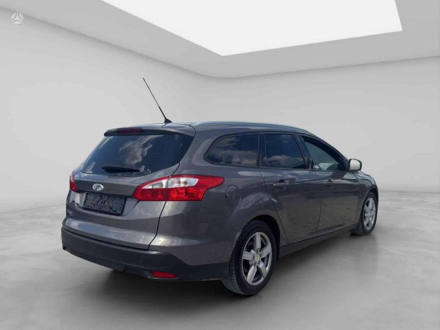 Brown Ford Focus 2011 in Kaunas, with an engine capacity of 1.60 L and mileage of 284 thousand km for 3990 €, photo 7 on AUTOMOTO.COM.LV