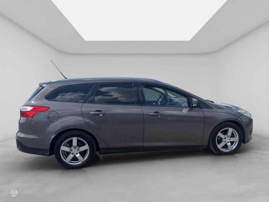 Brown Ford Focus 2011 in Kaunas, with an engine capacity of 1.60 L and mileage of 284 thousand km for 3990 €, photo 8 on AUTOMOTO.COM.LV