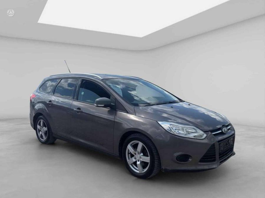 Brown Ford Focus 2011 in Kaunas, with an engine capacity of 1.60 L and mileage of 284 thousand km for 3990 €, photo 9 on AUTOMOTO.COM.LV