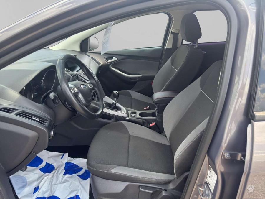 Brown Ford Focus 2011 in Kaunas, with an engine capacity of 1.60 L and mileage of 284 thousand km for 3990 €, photo 10 on AUTOMOTO.COM.LV