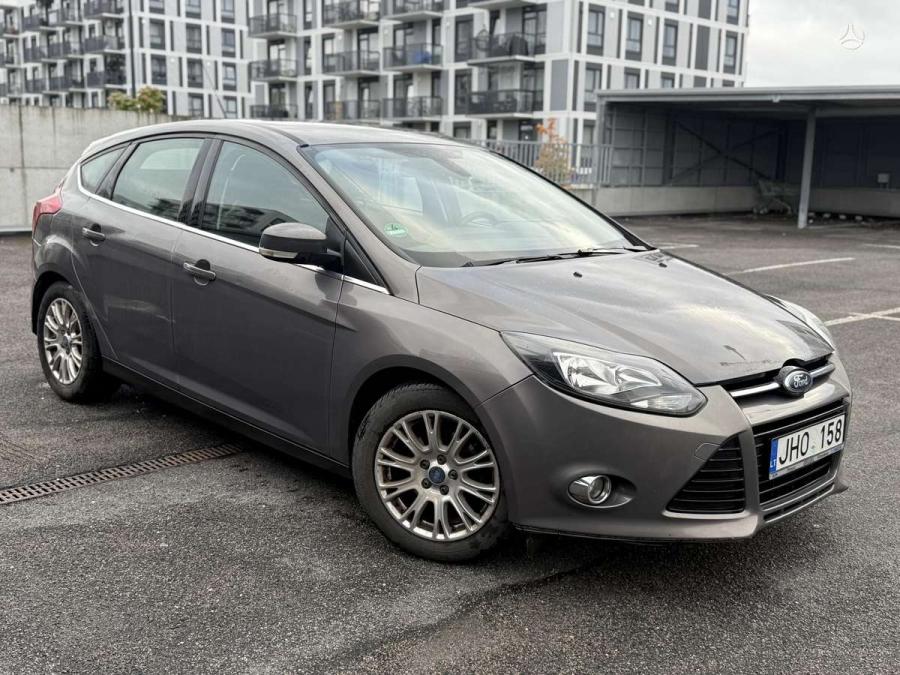 Brown Ford Focus 2011 in Vilnius, with an engine capacity of 1.56 L and mileage of 280 thousand km for 2650 €, photo 1 on AUTOMOTO.COM.LV