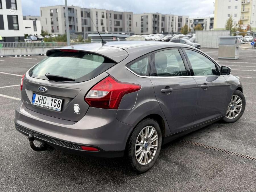 Brown Ford Focus 2011 in Vilnius, with an engine capacity of 1.56 L and mileage of 280 thousand km for 2650 €, photo 5 on AUTOMOTO.COM.LV