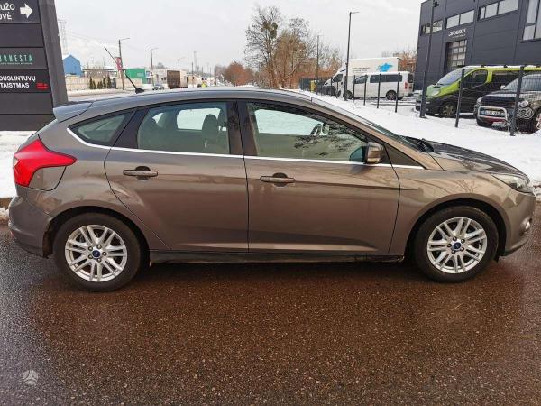 Brown Ford Focus 2013 in Kaunas, with an engine capacity of 1.00 L and mileage of 170 thousand km for 3100 €, photo 4 on AUTOMOTO.COM.LV