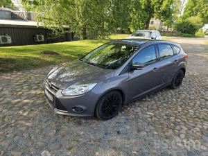 Brown Ford Focus 2013 in Cesis, with an engine capacity of 1.60 L and mileage of 299 thousand km for 4300 €, photo 4 on AUTOMOTO.COM.LV