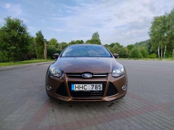 Brown Ford Focus 2014 in Vilnius, with an engine capacity of 1.00 L and mileage of 88 thousand km for 5250 €, photo 5 on AUTOMOTO.COM.LV