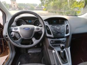 Brown Ford Focus 2014 in Vilnius, with an engine capacity of 1.00 L and mileage of 88 thousand km for 5250 €, photo 15 on AUTOMOTO.COM.LV