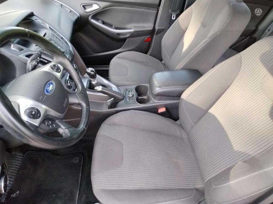 Brown Ford Focus 2014 in Vilnius, with an engine capacity of 1.00 L and mileage of 88 thousand km for 5250 €, photo 16 on AUTOMOTO.COM.LV