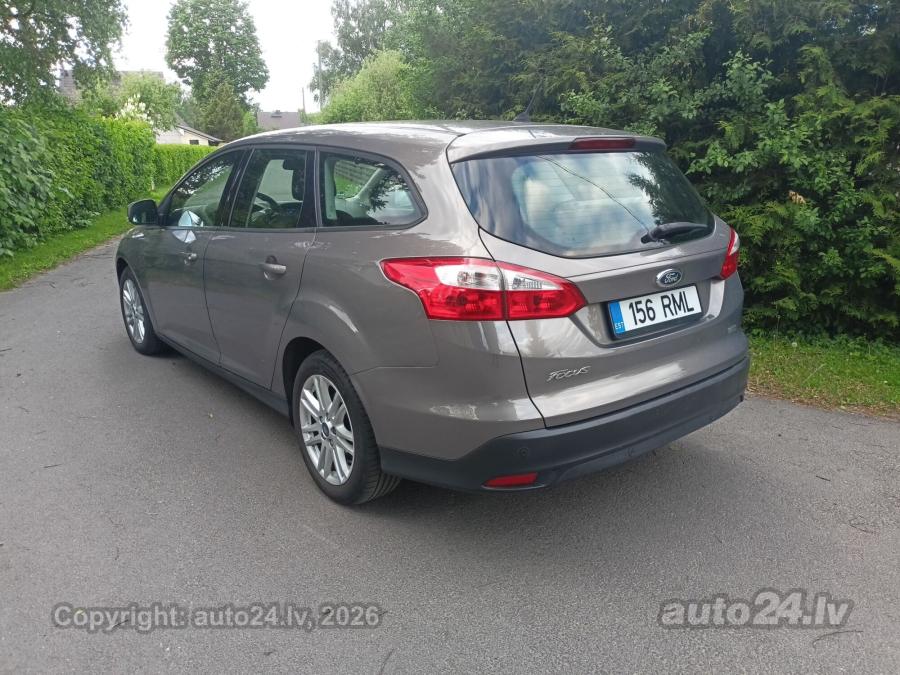 Brown Ford Focus 2013 in Paide, with an engine capacity of 1.60 L and mileage of 156 thousand km for 6800 €, photo 9 on AUTOMOTO.COM.LV