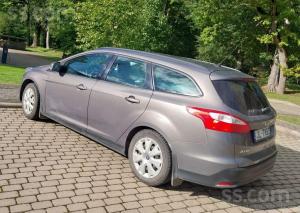 Brown Ford Focus 2013 in Talsi, with an engine capacity of 1.60 L and mileage of 243 thousand km for 3000 €, photo 9 on AUTOMOTO.COM.LV