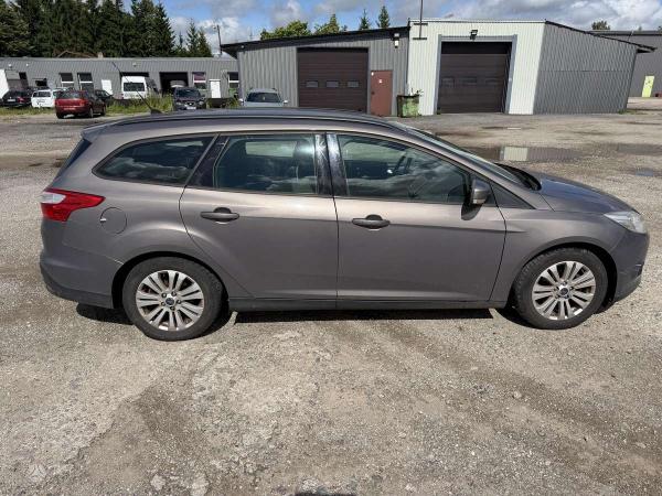 Brūns Ford Focus 2013 Kelmė, ar dzinēja tilpumu 1.56 L un nobraukumu 275 tūkst. km par 2800 €, foto 7 vietnē AUTOMOTO.COM.LV