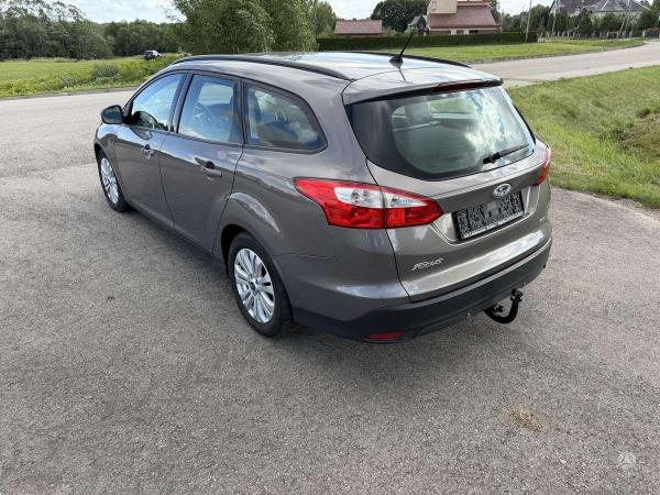 Brown Ford Focus 2013 in Kelme, with an engine capacity of 1.56 L and mileage of 274 thousand km for 2899 €, photo 5 on AUTOMOTO.COM.LV
