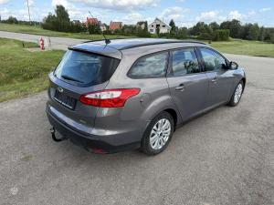 Brown Ford Focus 2013 in Kelme, with an engine capacity of 1.56 L and mileage of 274 thousand km for 2899 €, photo 8 on AUTOMOTO.COM.LV