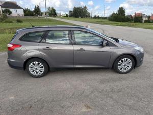 Brown Ford Focus 2013 in Kelme, with an engine capacity of 1.56 L and mileage of 274 thousand km for 2899 €, photo 9 on AUTOMOTO.COM.LV