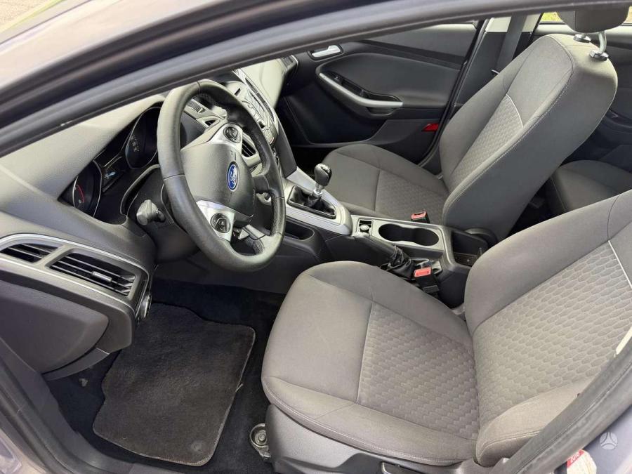 Brown Ford Focus 2013 in Kelme, with an engine capacity of 1.56 L and mileage of 274 thousand km for 2899 €, photo 10 on AUTOMOTO.COM.LV