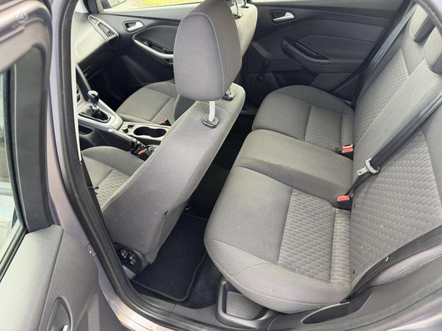 Brown Ford Focus 2013 in Kelme, with an engine capacity of 1.56 L and mileage of 274 thousand km for 2899 €, photo 12 on AUTOMOTO.COM.LV