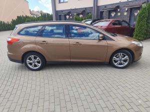 Brown Ford Focus 2013 in Kaunas, with an engine capacity of 2.00 L and mileage of 278 thousand km for 1600 €, photo 4 on AUTOMOTO.COM.LV