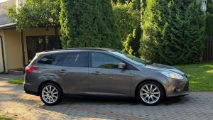 Brown Ford Focus 2013 in Vilnius, with an engine capacity of 2.00 L and mileage of 234 thousand km for 1950 €, photo 7 on AUTOMOTO.COM.LV