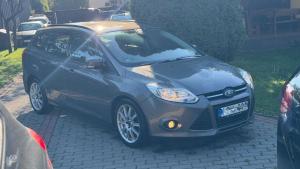 Brown Ford Focus 2013 in Vilnius, with an engine capacity of 2.00 L and mileage of 234 thousand km for 1950 €, photo 8 on AUTOMOTO.COM.LV
