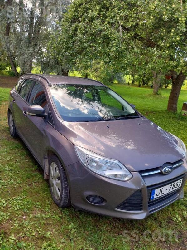 Brown Ford Focus 2013 in Talsi, with an engine capacity of 1.60 L and mileage of 243 thousand km for 2990 €, photo 10 on AUTOMOTO.COM.LV