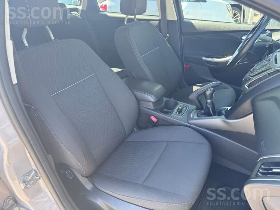 Brown Ford Focus 2014 in Ogre, with an engine capacity of 1.20 L and mileage of 175 thousand km for 4995 €, photo 13 on AUTOMOTO.COM.LV