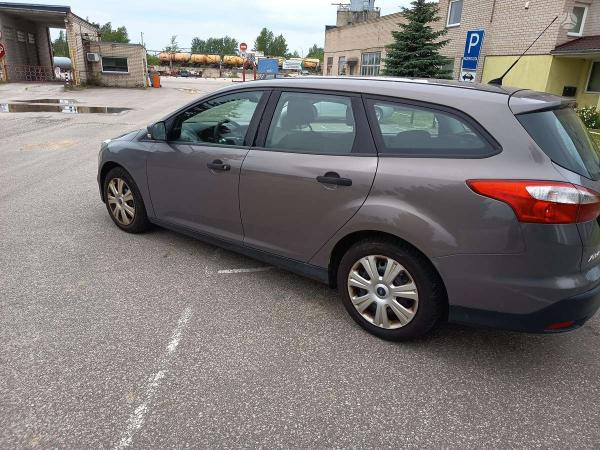 Brown Ford Focus 2014 in Rokiskis, with an engine capacity of 1.00 L and mileage of 205 thousand km for 2300 €, photo 4 on AUTOMOTO.COM.LV