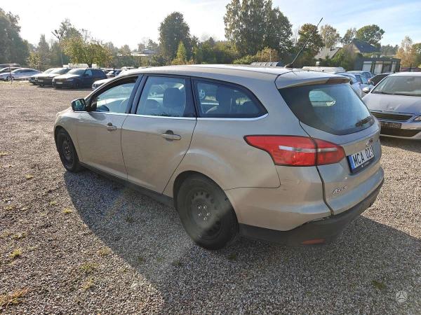 Brown Ford Focus 2015 in Vilnius, with an engine capacity of 1.50 L and mileage of 313 thousand km for 2700 €, photo 8 on AUTOMOTO.COM.LV
