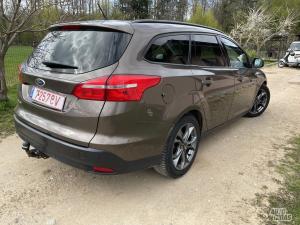 Brown Ford Focus 2016 in Sakiai, with an engine capacity of 1.50 L and mileage of 301 thousand km for 5499 €, photo 4 on AUTOMOTO.COM.LV