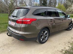 Brown Ford Focus 2016 in Sakiai, with an engine capacity of 1.50 L and mileage of 301 thousand km for 5499 €, photo 5 on AUTOMOTO.COM.LV