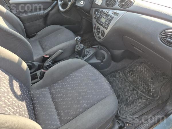Green Ford Focus 1998 in Riga, with an engine capacity of 1.40 L and mileage of 252 thousand km for 700 €, photo 10 on AUTOMOTO.COM.LV