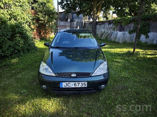 Zaļš Ford Focus 2004 Rīga, ar dzinēja tilpumu 1.80 L un nobraukumu 291 tūkst. km par 800 €, foto 4 vietnē AUTOMOTO.COM.LV