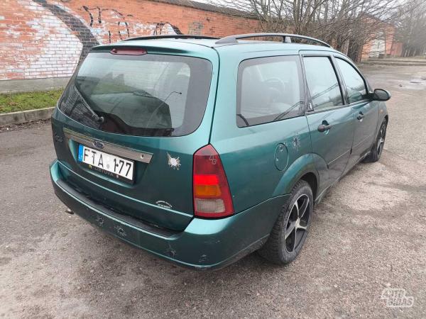Zaļš Ford Focus 1999 Šauļi, ar dzinēja tilpumu 1.80 L un nobraukumu 391 tūkst. km par 280 €, foto 4 vietnē AUTOMOTO.COM.LV