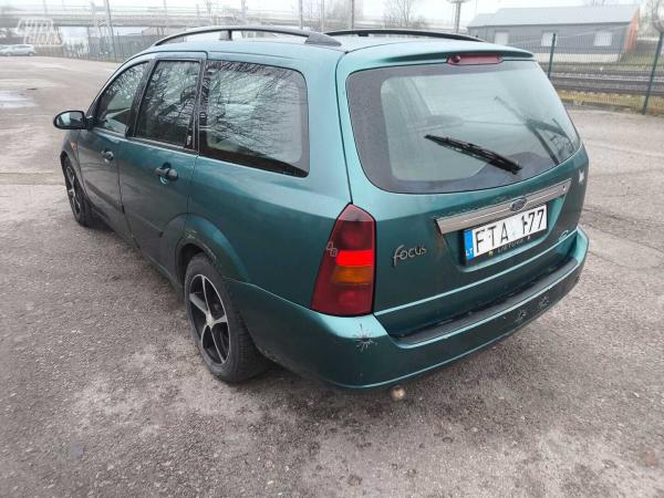 Zaļš Ford Focus 1999 Šauļi, ar dzinēja tilpumu 1.80 L un nobraukumu 391 tūkst. km par 280 €, foto 6 vietnē AUTOMOTO.COM.LV
