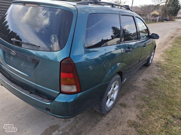Green Ford Focus 2000 in Mazeikiai, with an engine capacity of 1.80 L and mileage of 300 thousand km for 320 €, photo 3 on AUTOMOTO.COM.LV