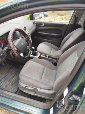 Green Ford Focus 2007 in Riga, with an engine capacity of 1.60 L and mileage of 305 thousand km for 1050 €, photo 8 on AUTOMOTO.COM.LV