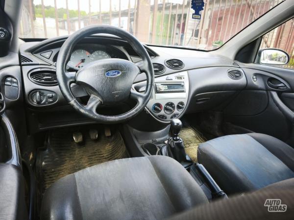 Grey Ford Focus 2003 in Kaunas, with an engine capacity of 1.80 L and mileage of 235 thousand km for 350 €, photo 6 on AUTOMOTO.COM.LV