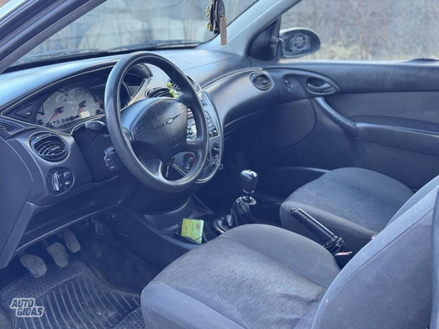 Pelēks Ford Focus 2004 Radviliškis, ar dzinēja tilpumu 1.80 L un nobraukumu 290 tūkst. km par 350 €, foto 12 vietnē AUTOMOTO.COM.LV