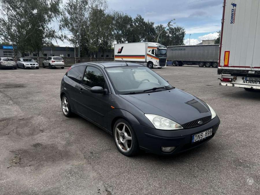 Pelēks Ford Focus 2004 Panevēža, ar dzinēja tilpumu 1.80 L un nobraukumu 275 tūkst. km par 900 €, foto 7 vietnē AUTOMOTO.COM.LV