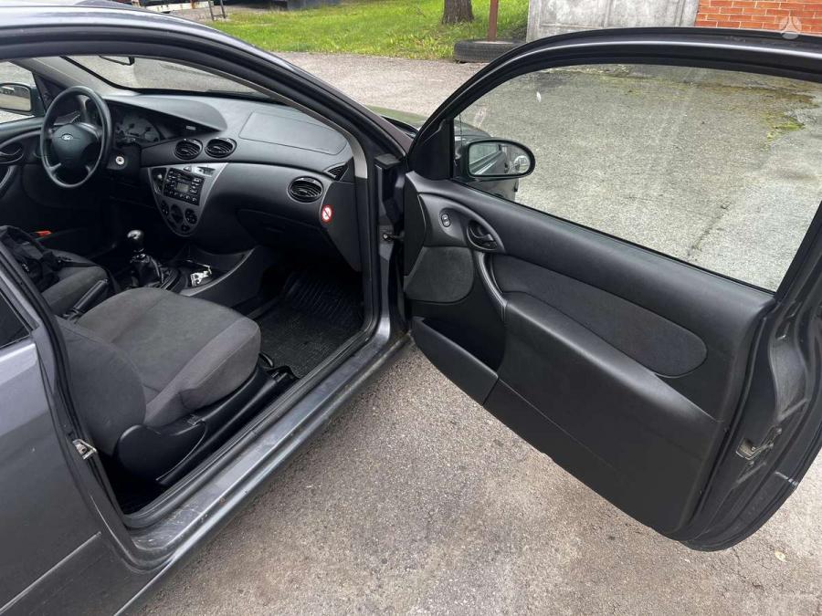Pelēks Ford Focus 2004 Panevēža, ar dzinēja tilpumu 1.80 L un nobraukumu 275 tūkst. km par 900 €, foto 8 vietnē AUTOMOTO.COM.LV